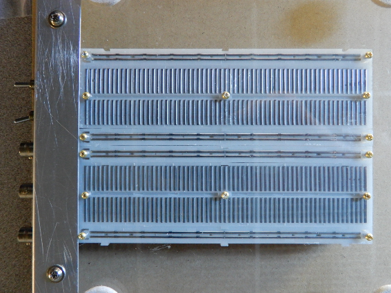 A breadboard consists of a matrix of holes, electrically connected in ...